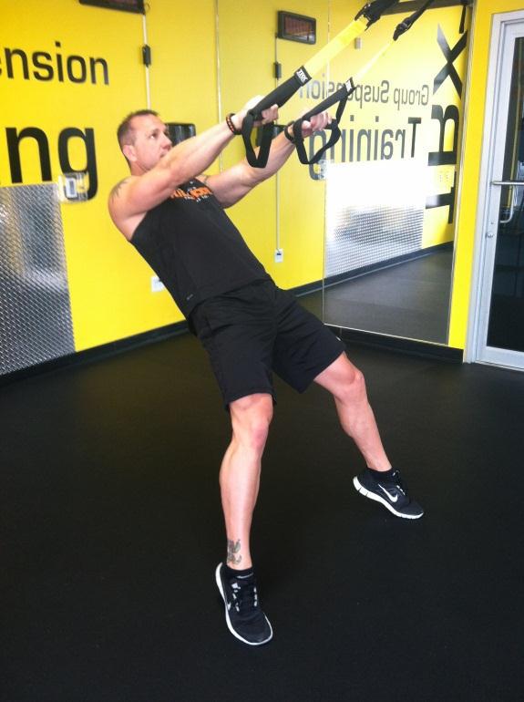 Learn How To Do a TRX Squat To Build Up Your Legs
