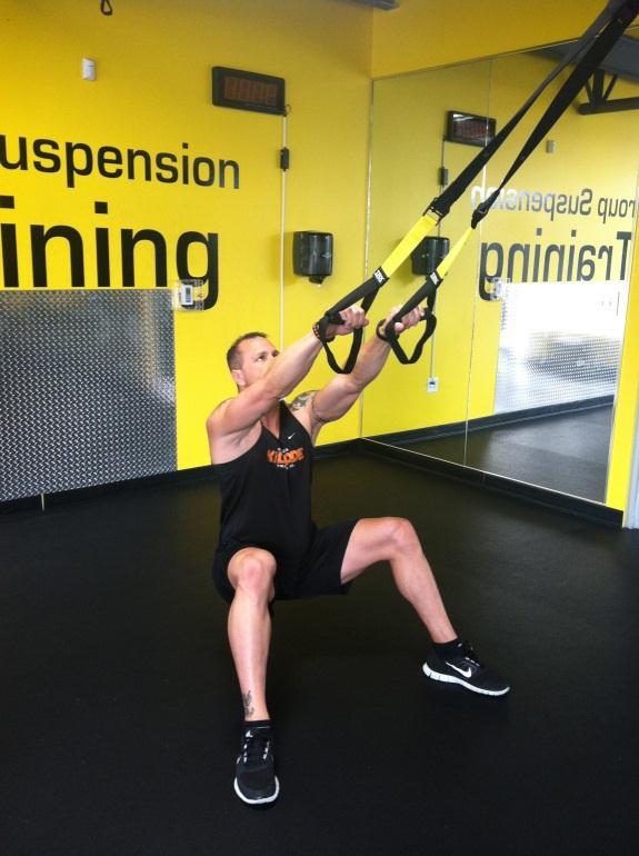 Learn How To Do a TRX Squat To Build Up Your Legs